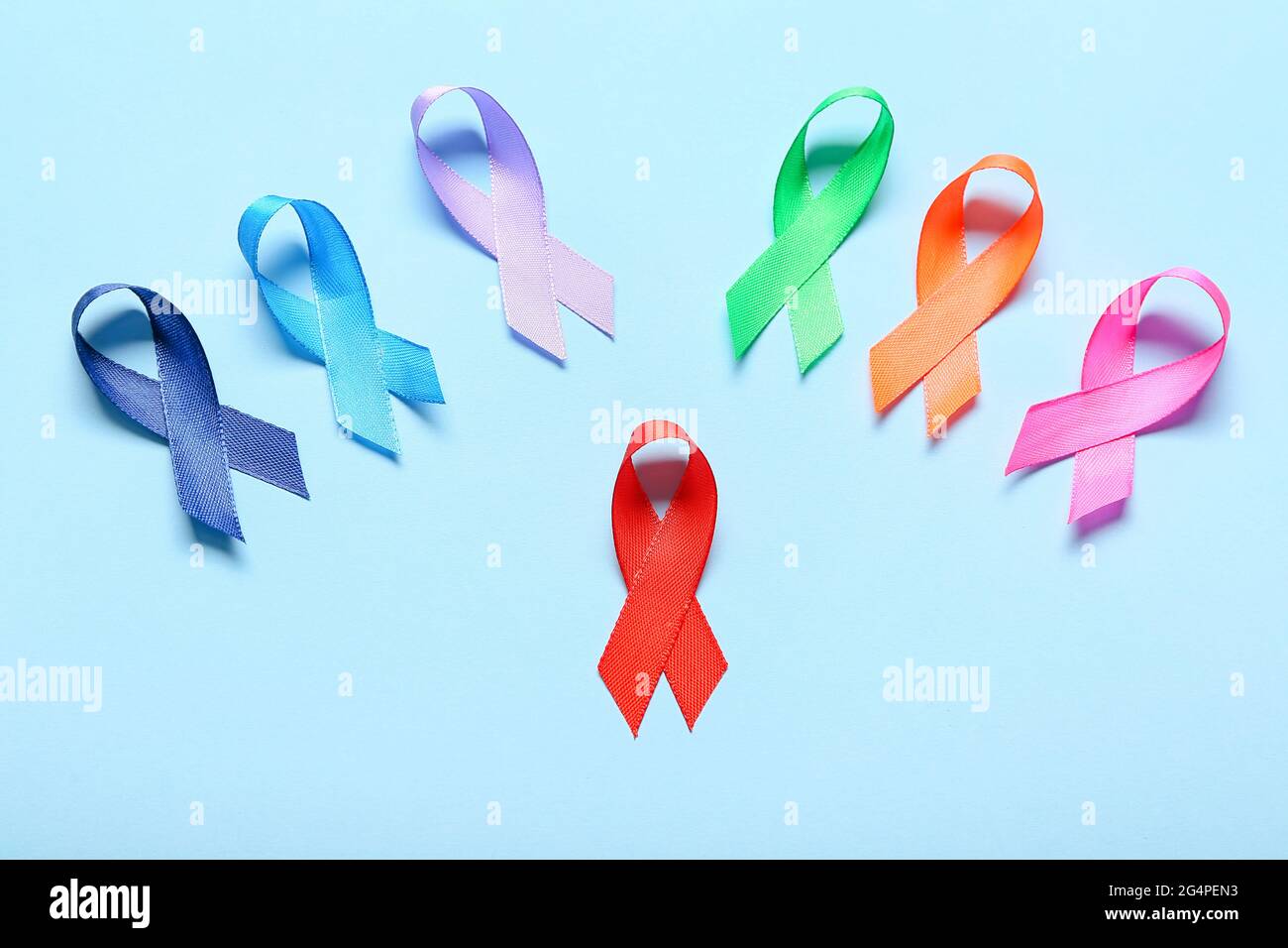 Different awareness ribbons on color background Stock Photo - Alamy