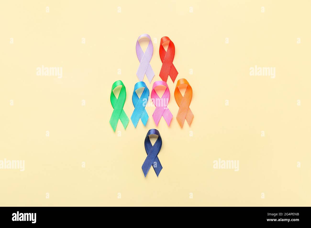 Different awareness ribbons on color background Stock Photo - Alamy