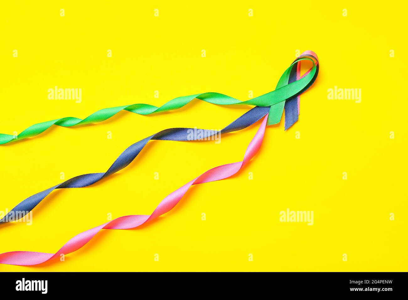 Different awareness ribbons on color background Stock Photo - Alamy