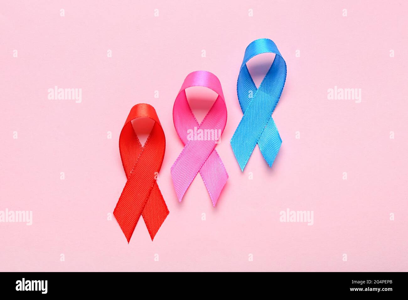 Different awareness ribbons on color background Stock Photo - Alamy