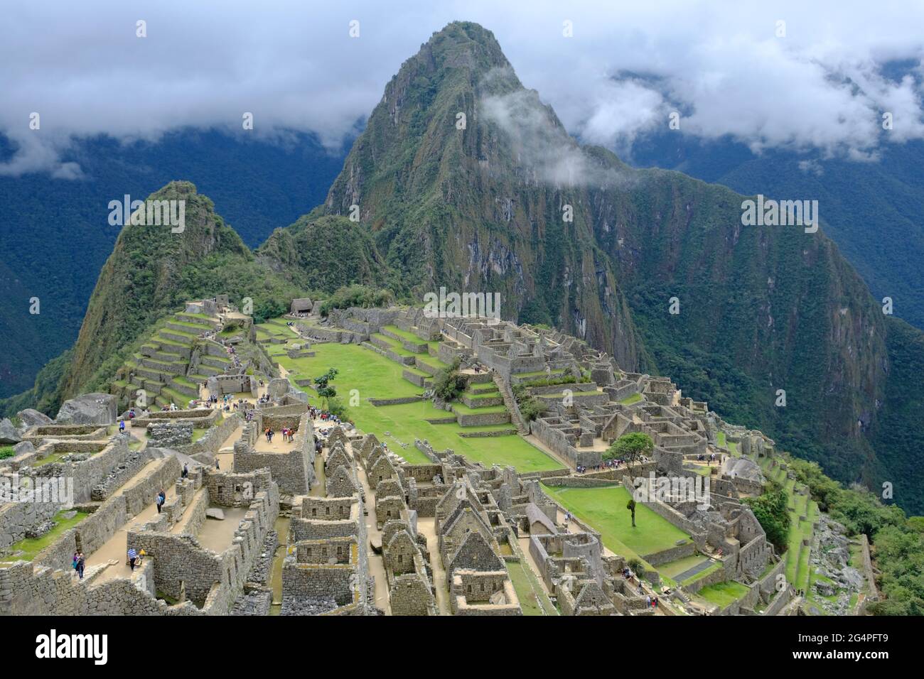 Peru Machu Picchu - Aerial view of Machu Picchu ruins with green ...