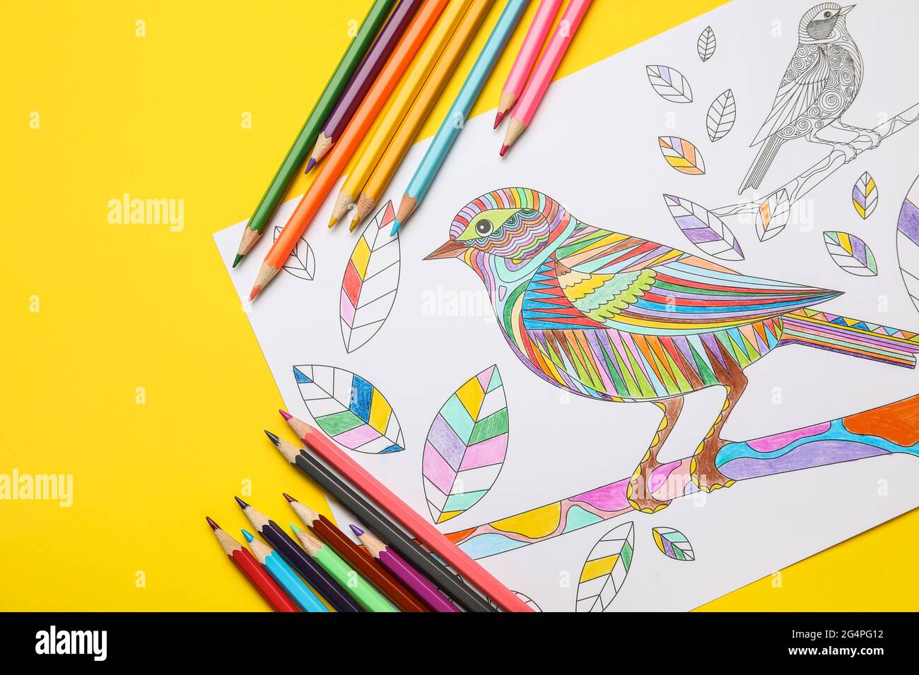 Composition with coloring picture on table Stock Photo - Alamy