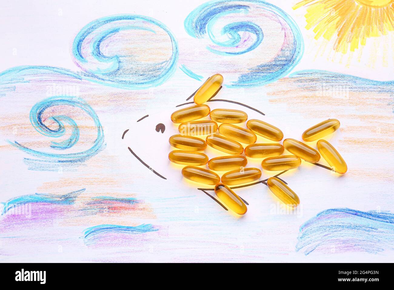 Drawn fish with oil capsules on white background Stock Photo - Alamy