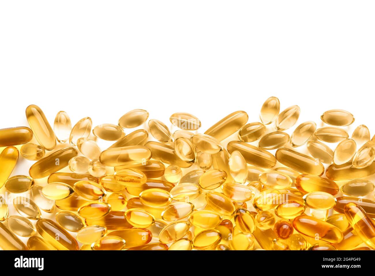 Fish oil capsules on white background Stock Photo - Alamy