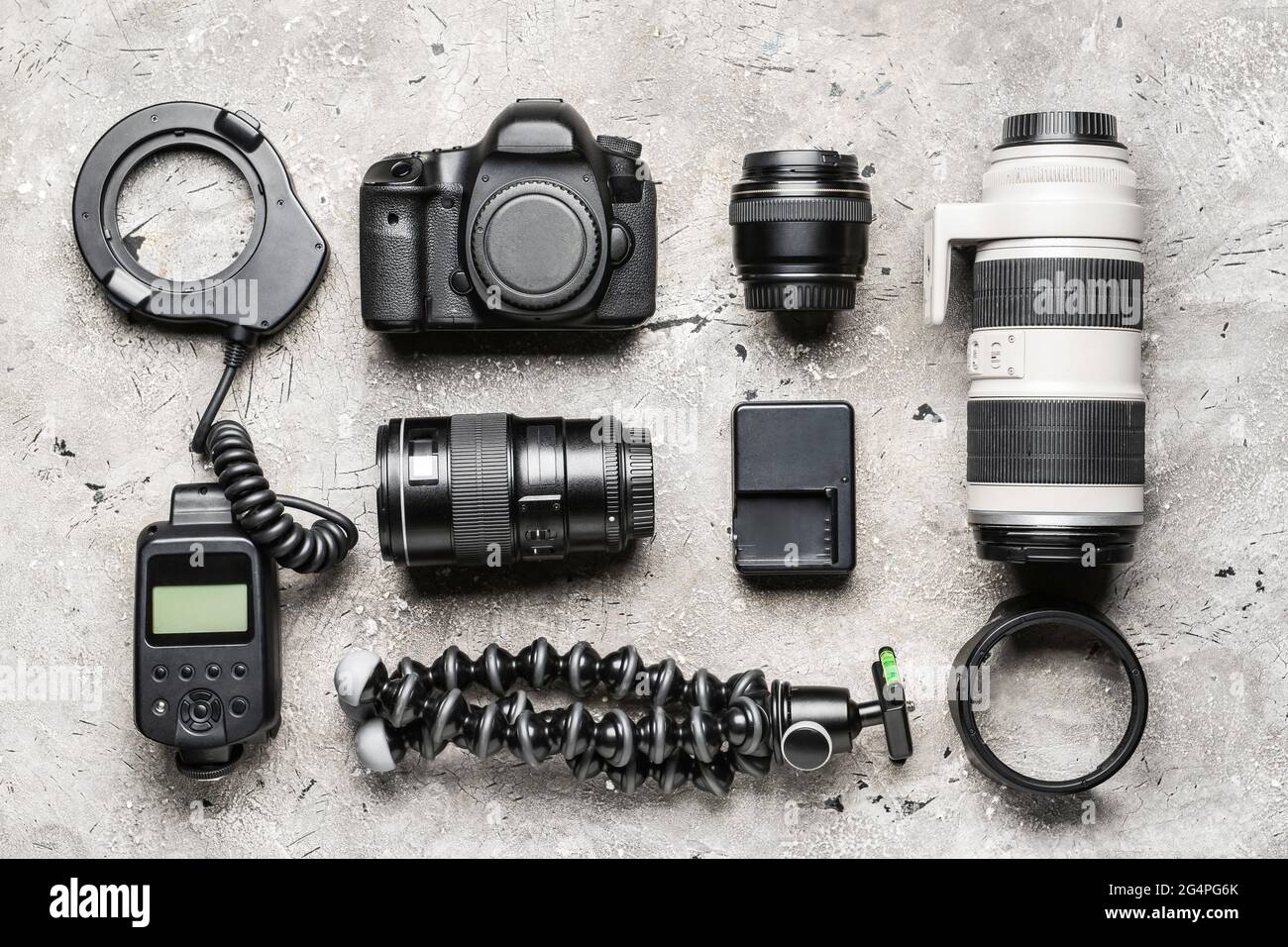 Modern photographer's equipment on grunge background Stock Photo - Alamy