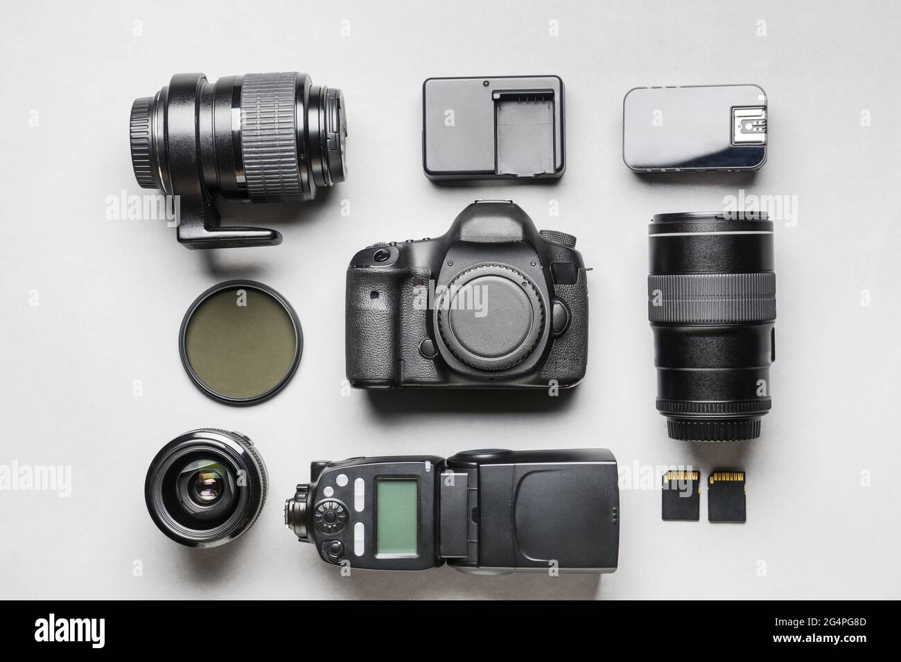 Modern photographer's equipment on light background Stock Photo - Alamy