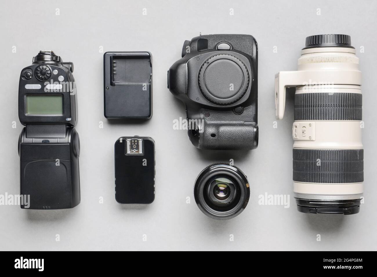 Modern photographer's equipment on light background Stock Photo - Alamy
