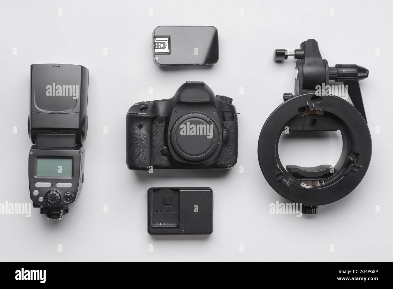 Modern photographer's equipment on light background Stock Photo - Alamy