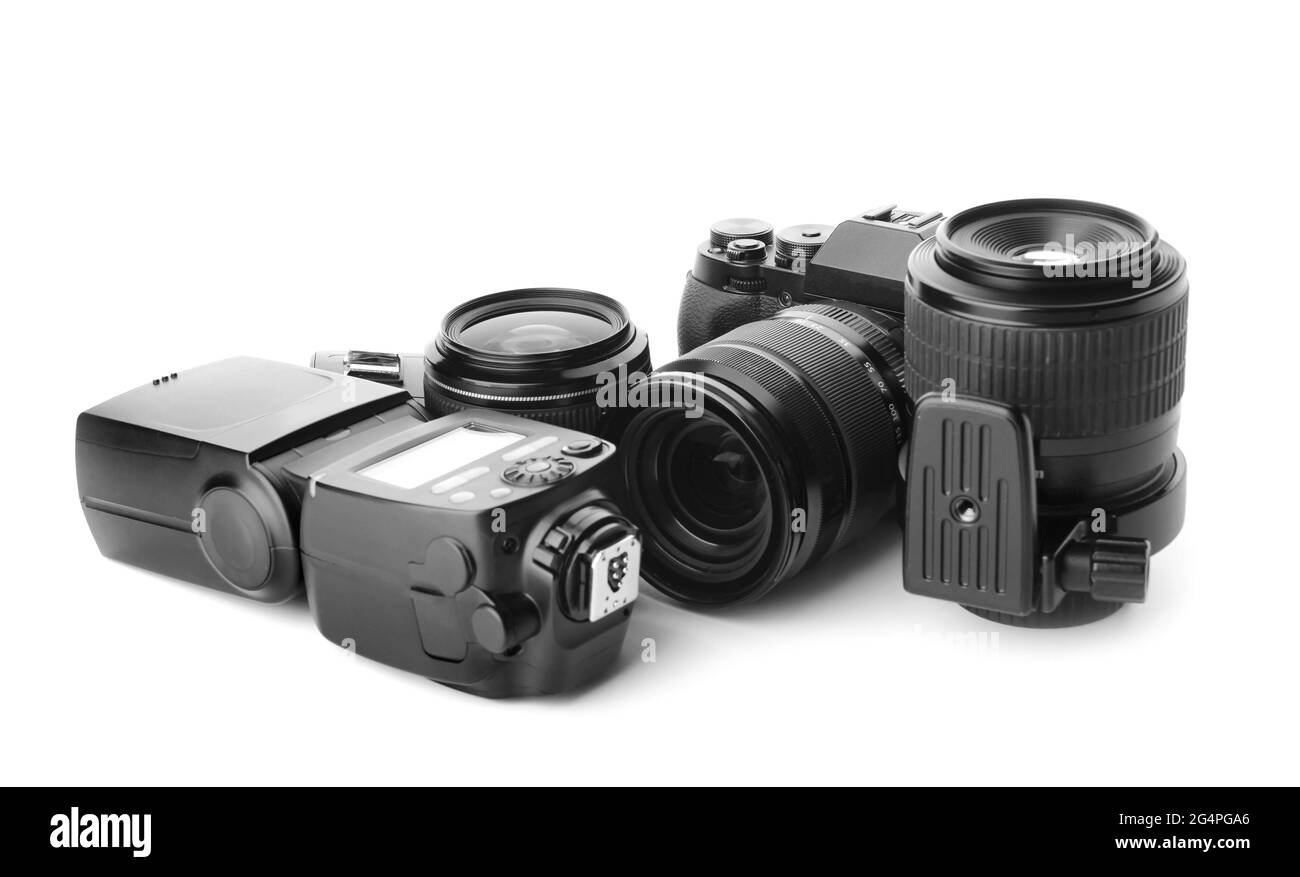 Modern photographer's equipment on white background Stock Photo - Alamy
