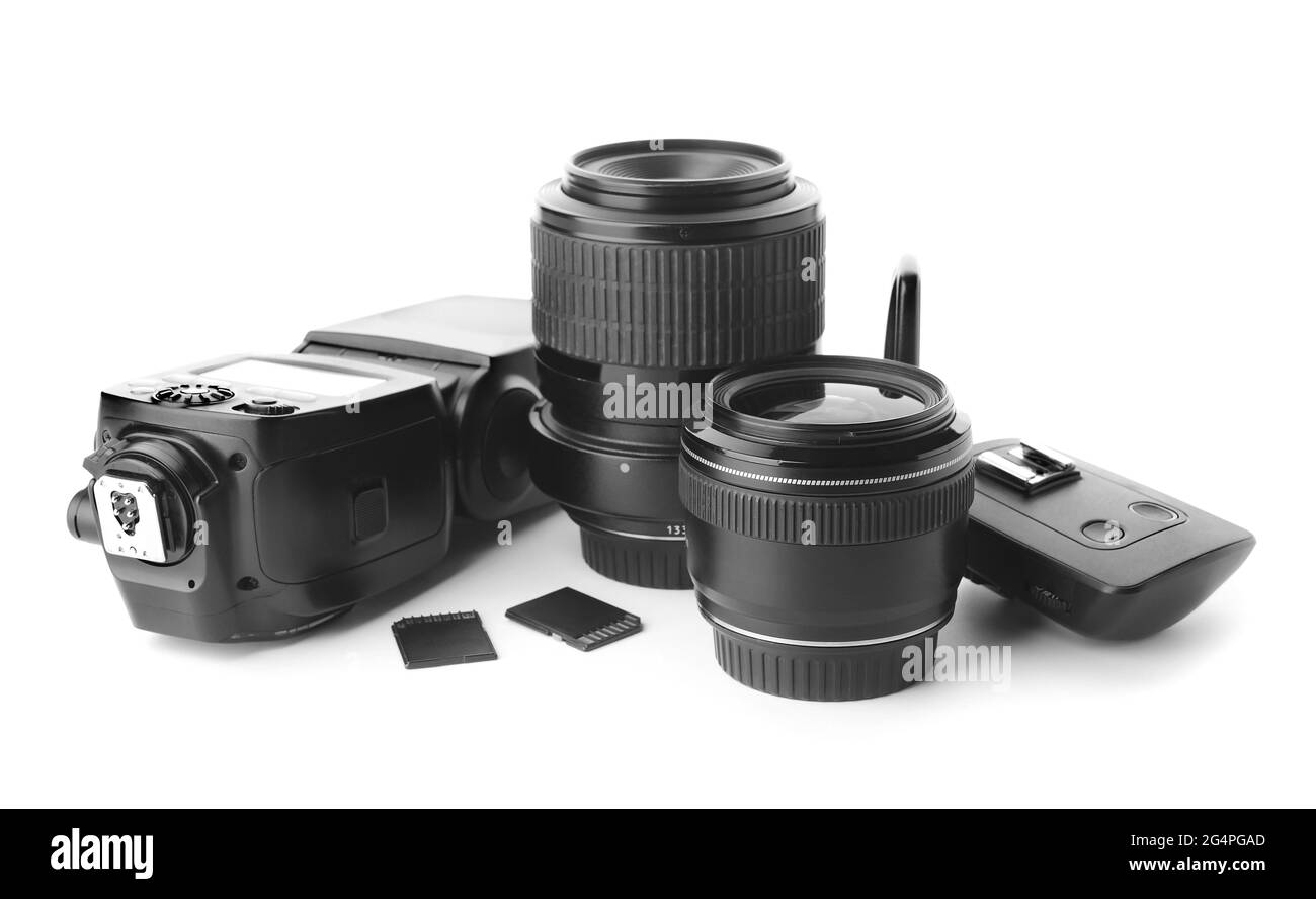 Modern photographer's equipment on white background Stock Photo - Alamy