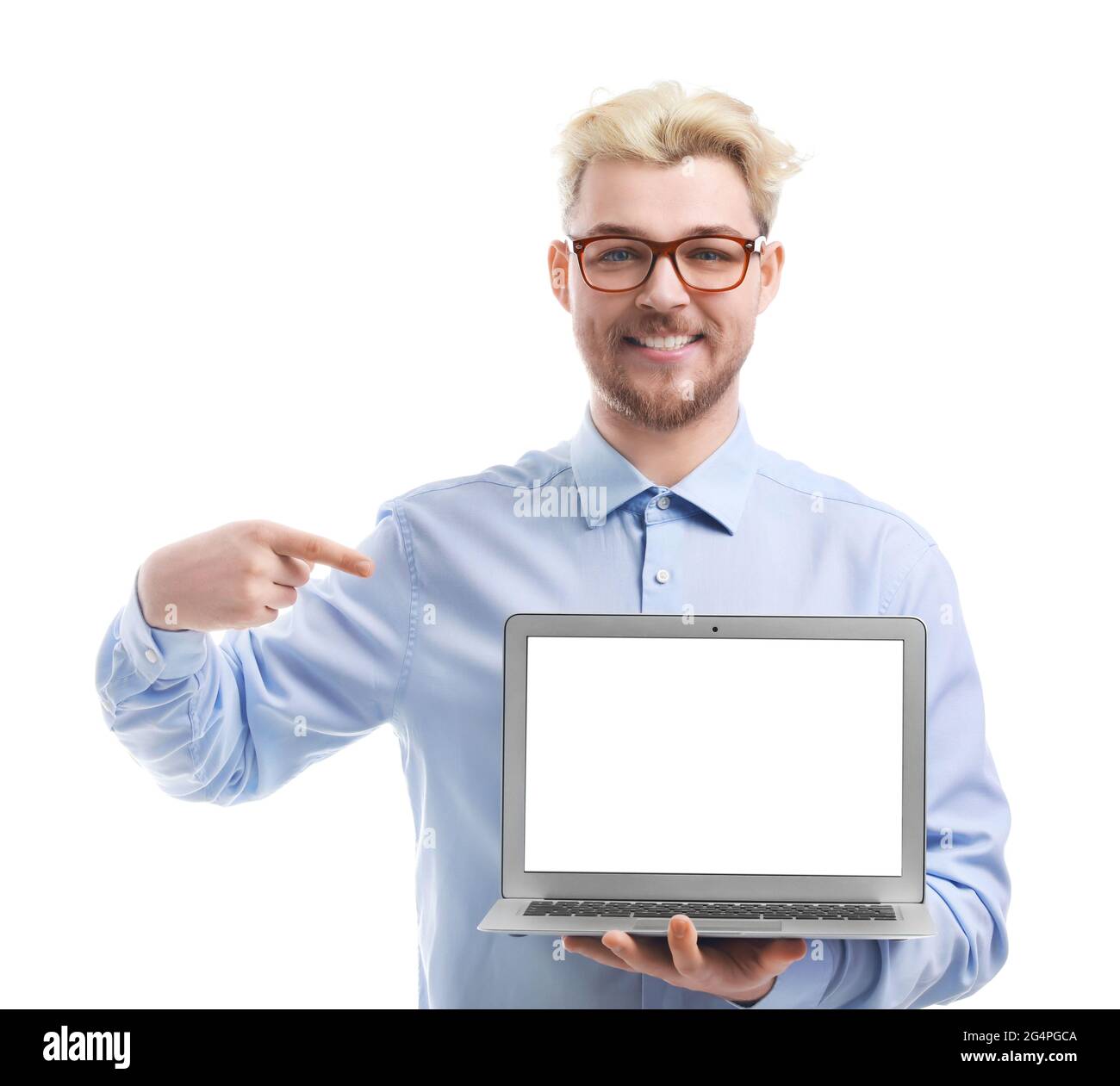Young man pointing at laptop on white background Stock Photo - Alamy