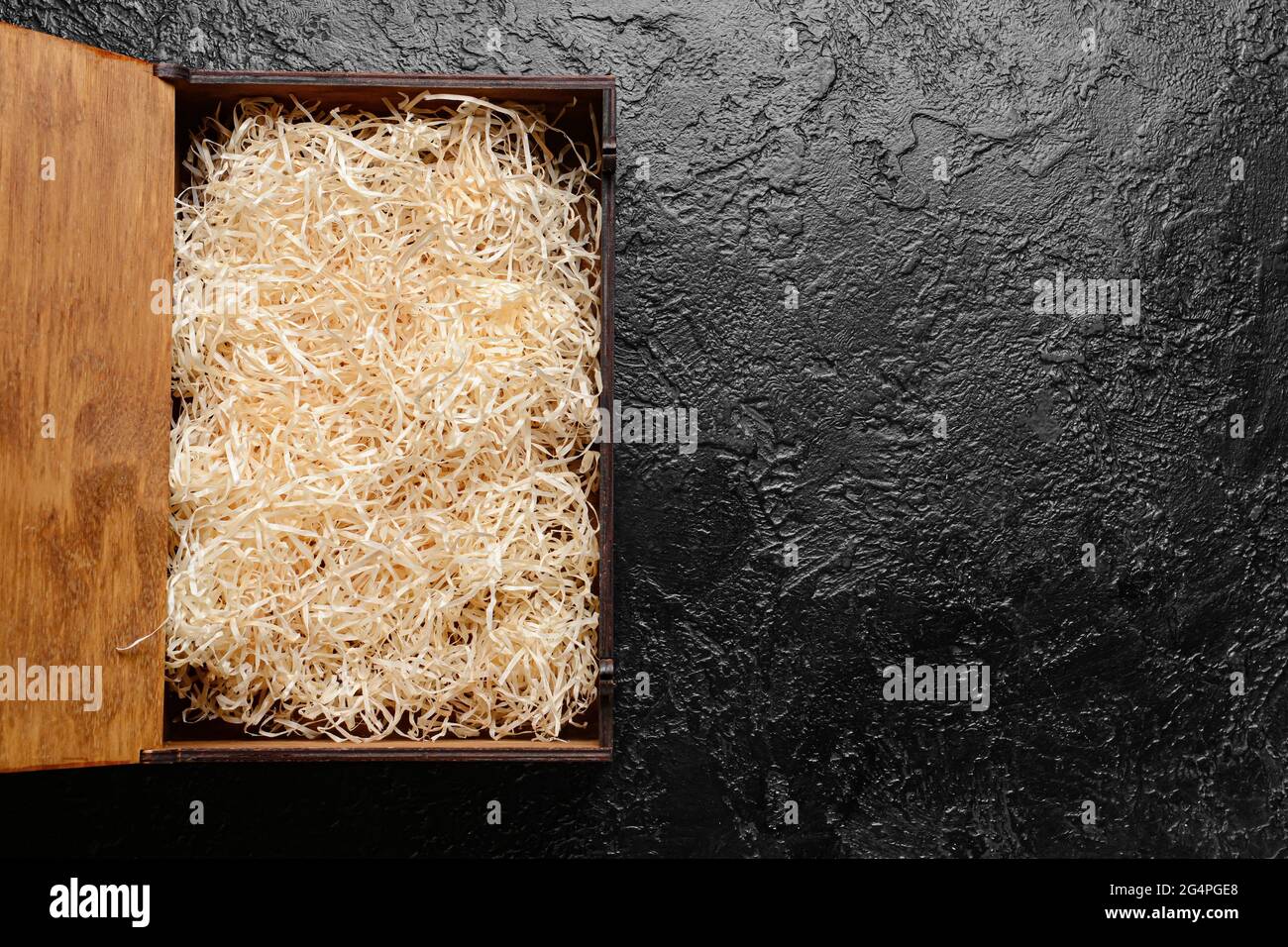Open wine box on dark background Stock Photo - Alamy