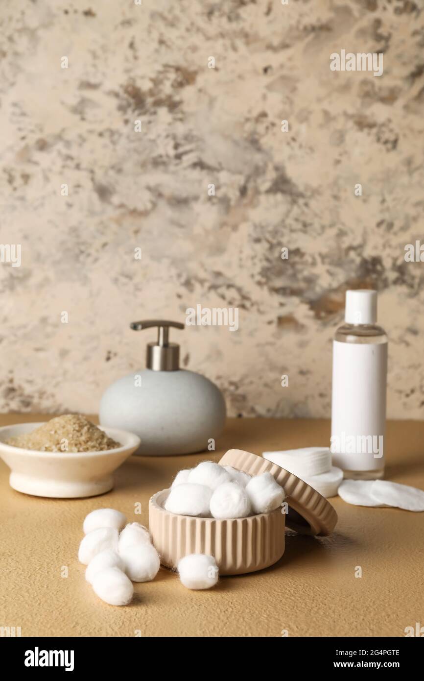 Container with soft cotton wool on table in bathroom Stock Photo - Alamy