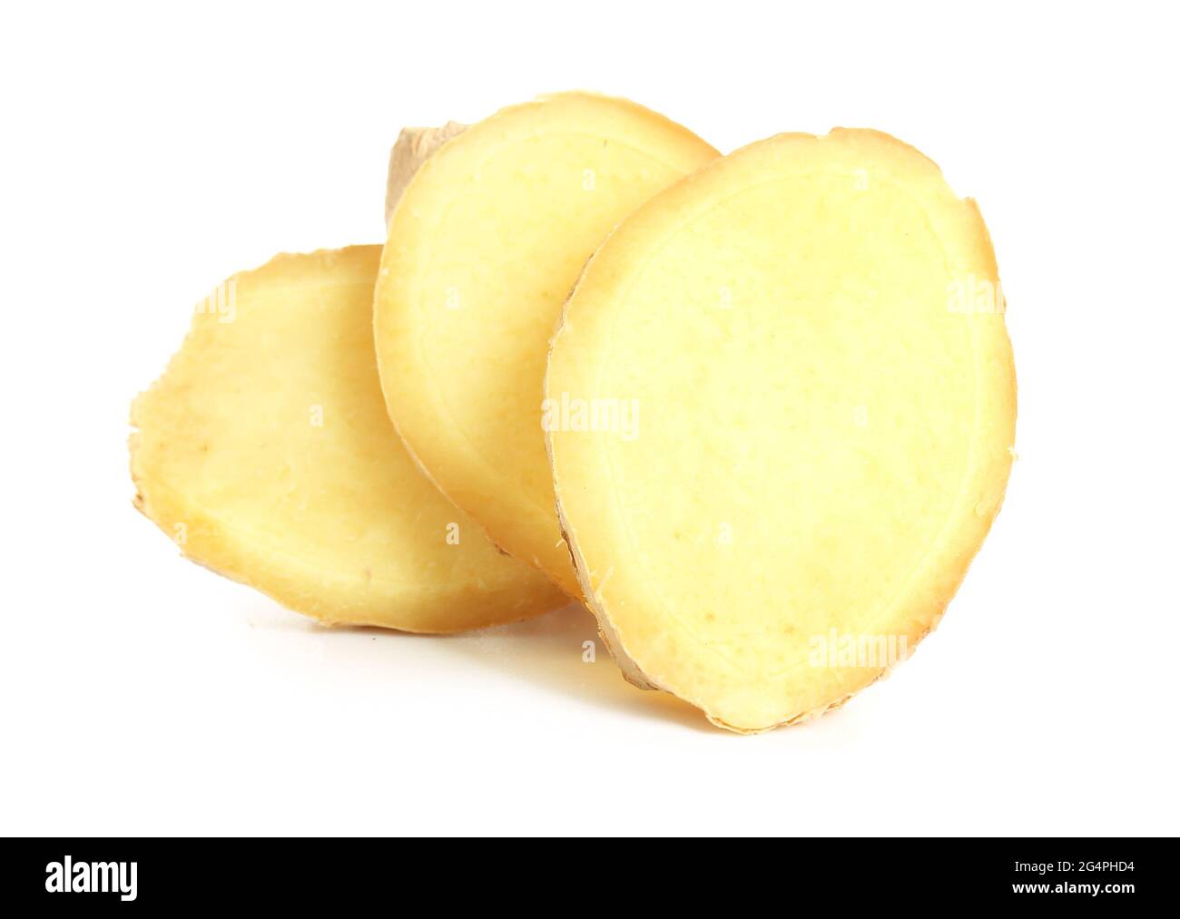 Slices of fresh ginger on white background Stock Photo - Alamy