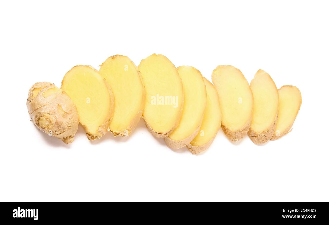 Slices of fresh ginger on white background Stock Photo - Alamy