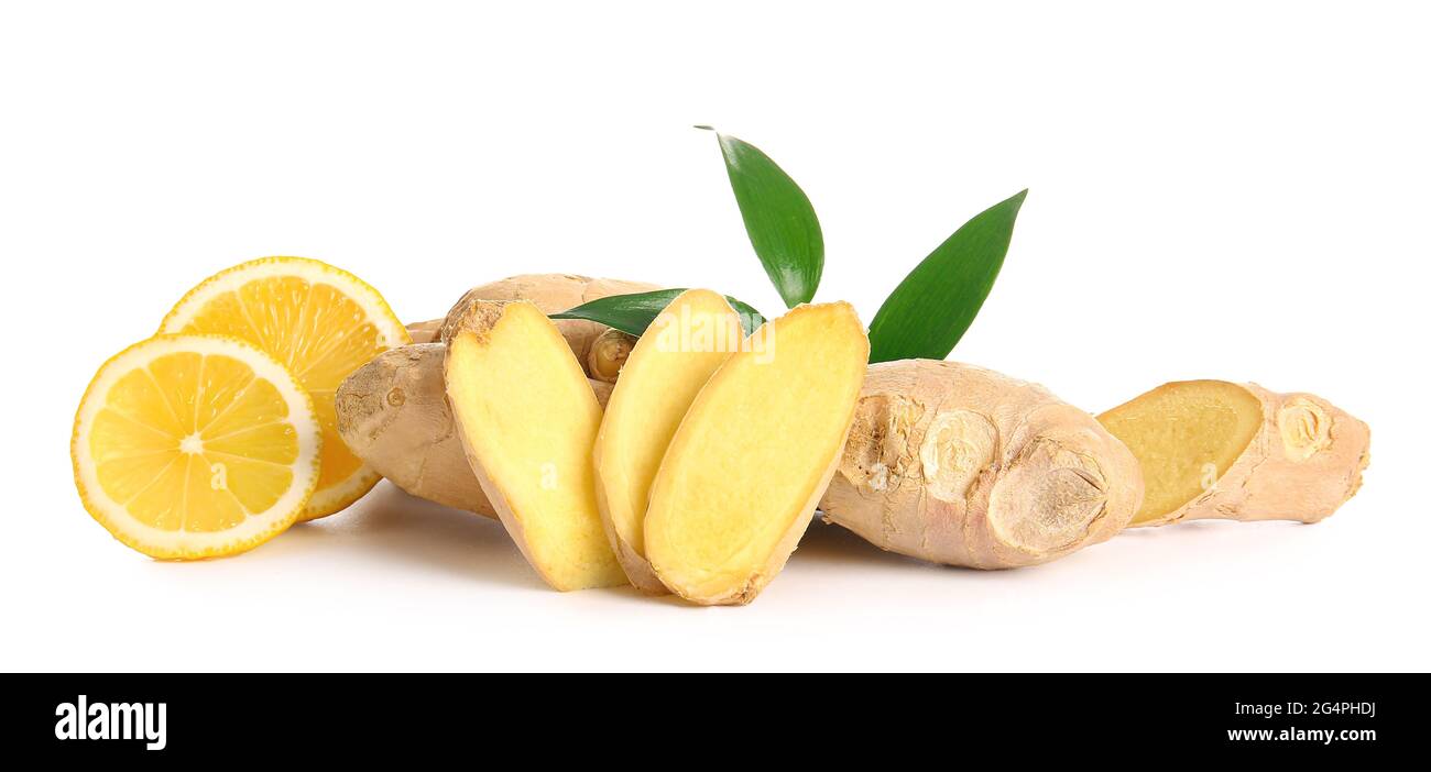 Fresh ginger with lemon on white background Stock Photo - Alamy