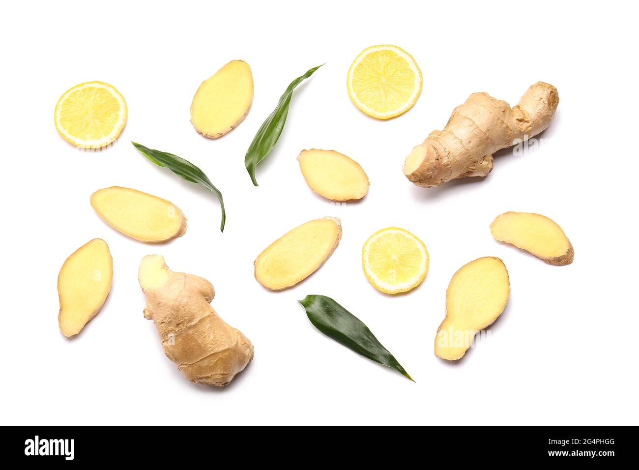 Fresh ginger with lemon on white background Stock Photo - Alamy
