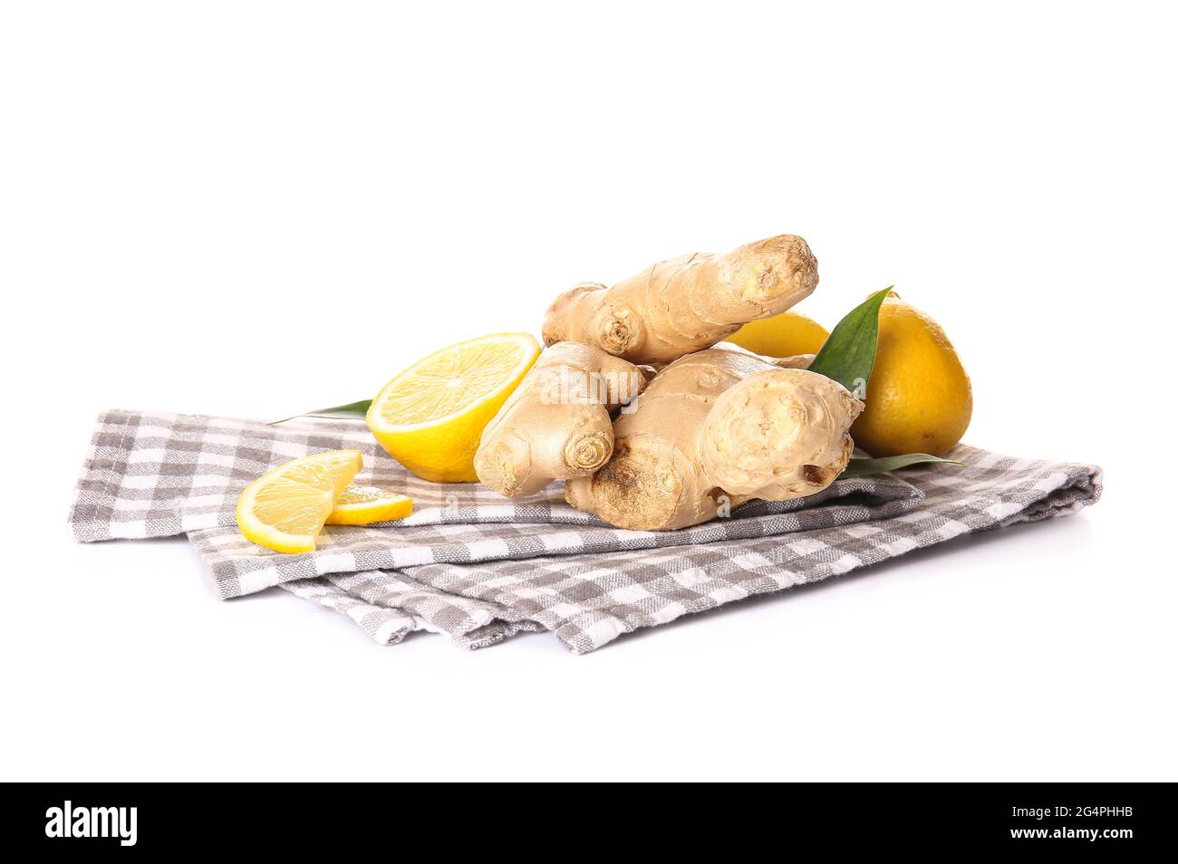 Fresh ginger with lemon on white background Stock Photo - Alamy