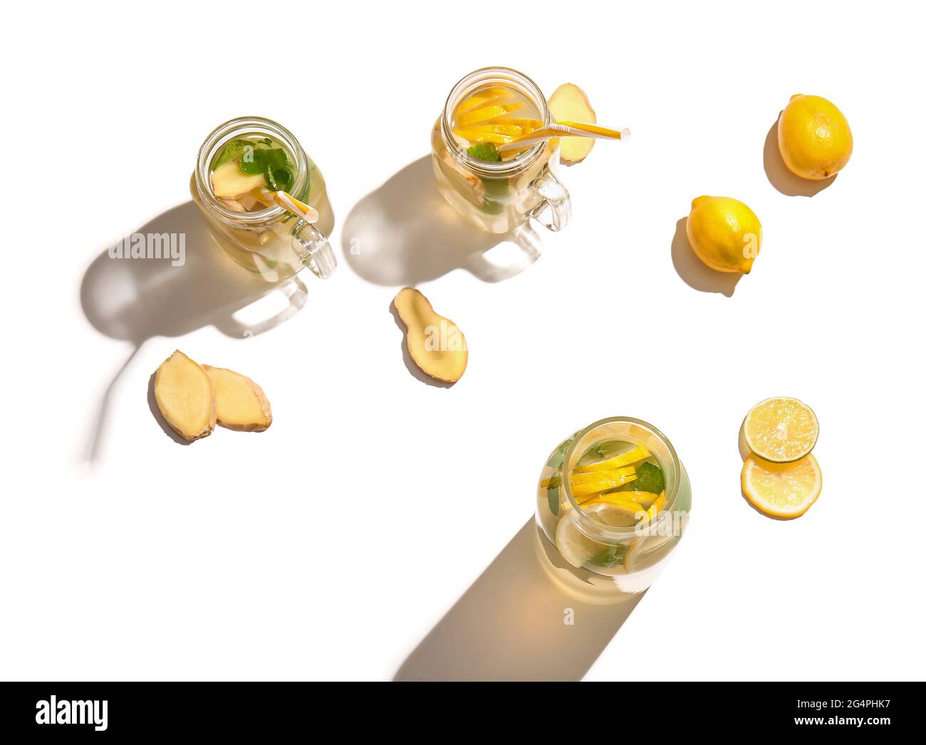 Cold ginger lemonade on white background Stock Photo - Alamy
