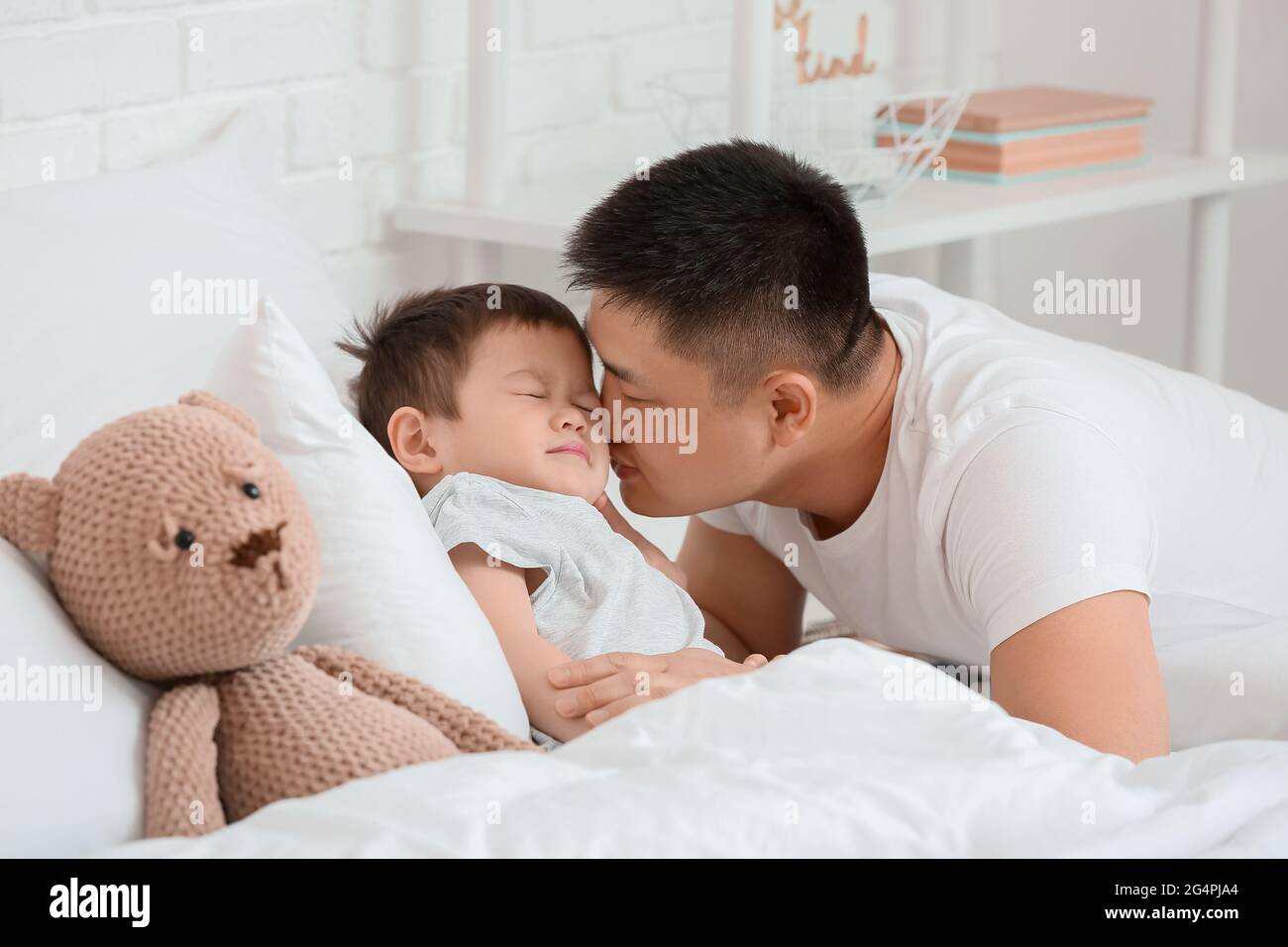 Boy waking father hi-res stock photography and images - Alamy
