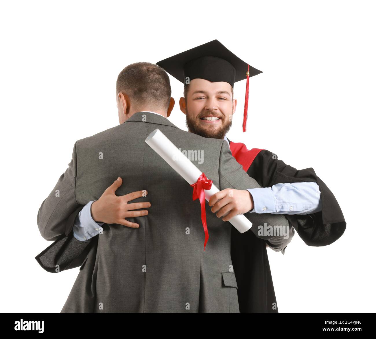 Father hugging son at graduation hi-res stock photography and images ...