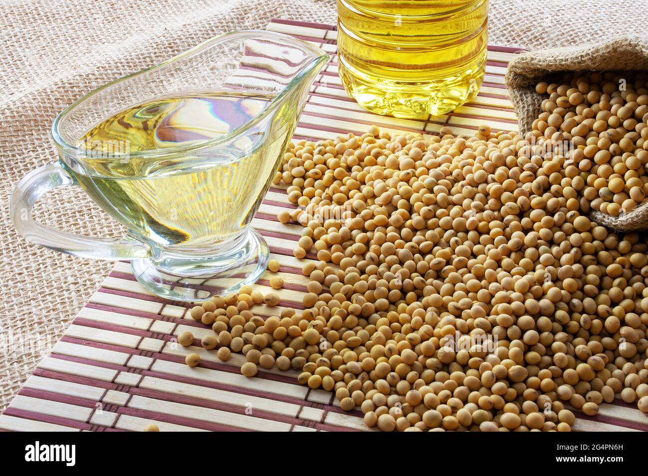 soybeans in a jute bag in a composition with soybean oil - 2021 soybean ...