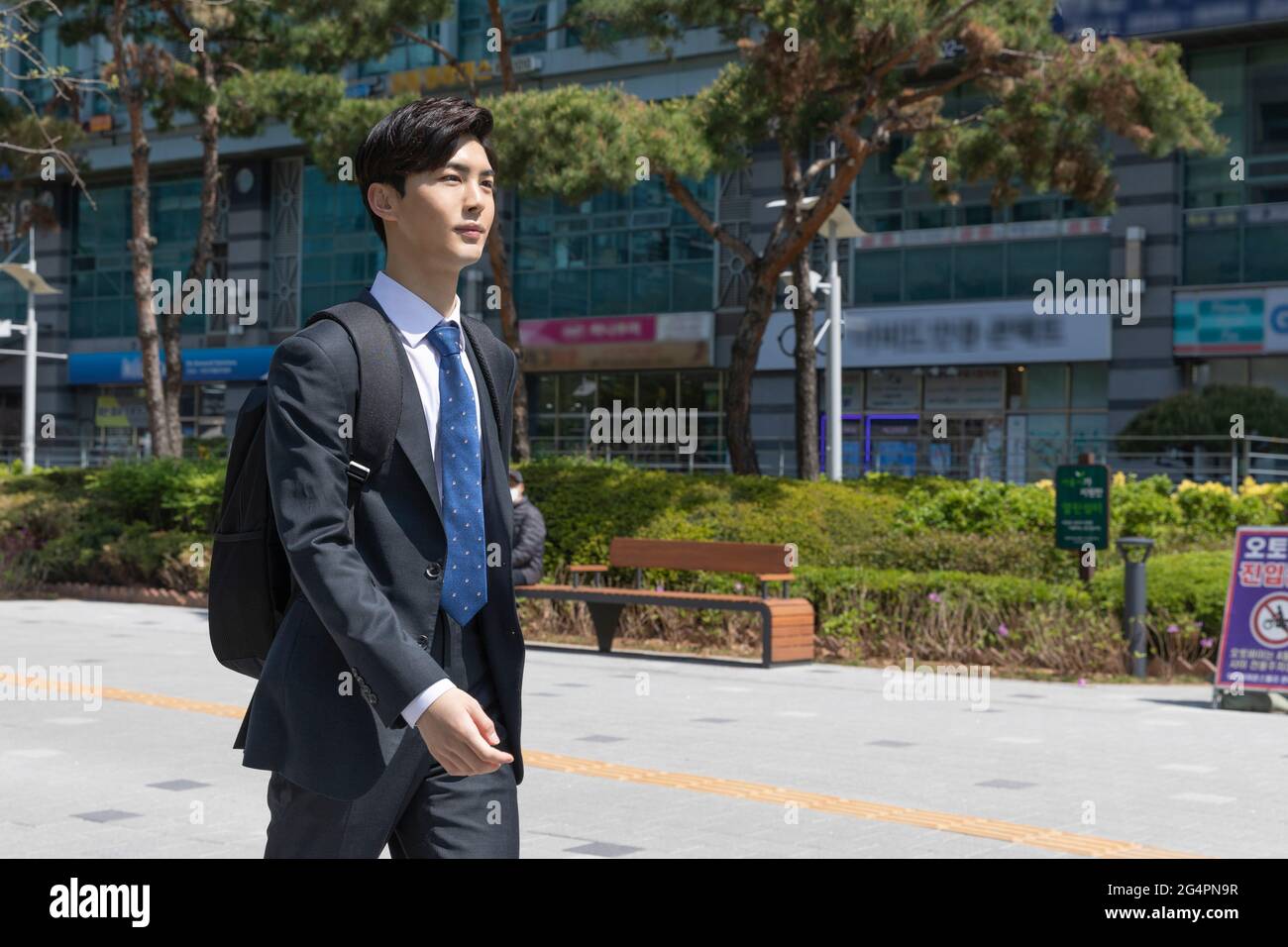 first day of newly recruited Asian man employee in smart casual suit ...