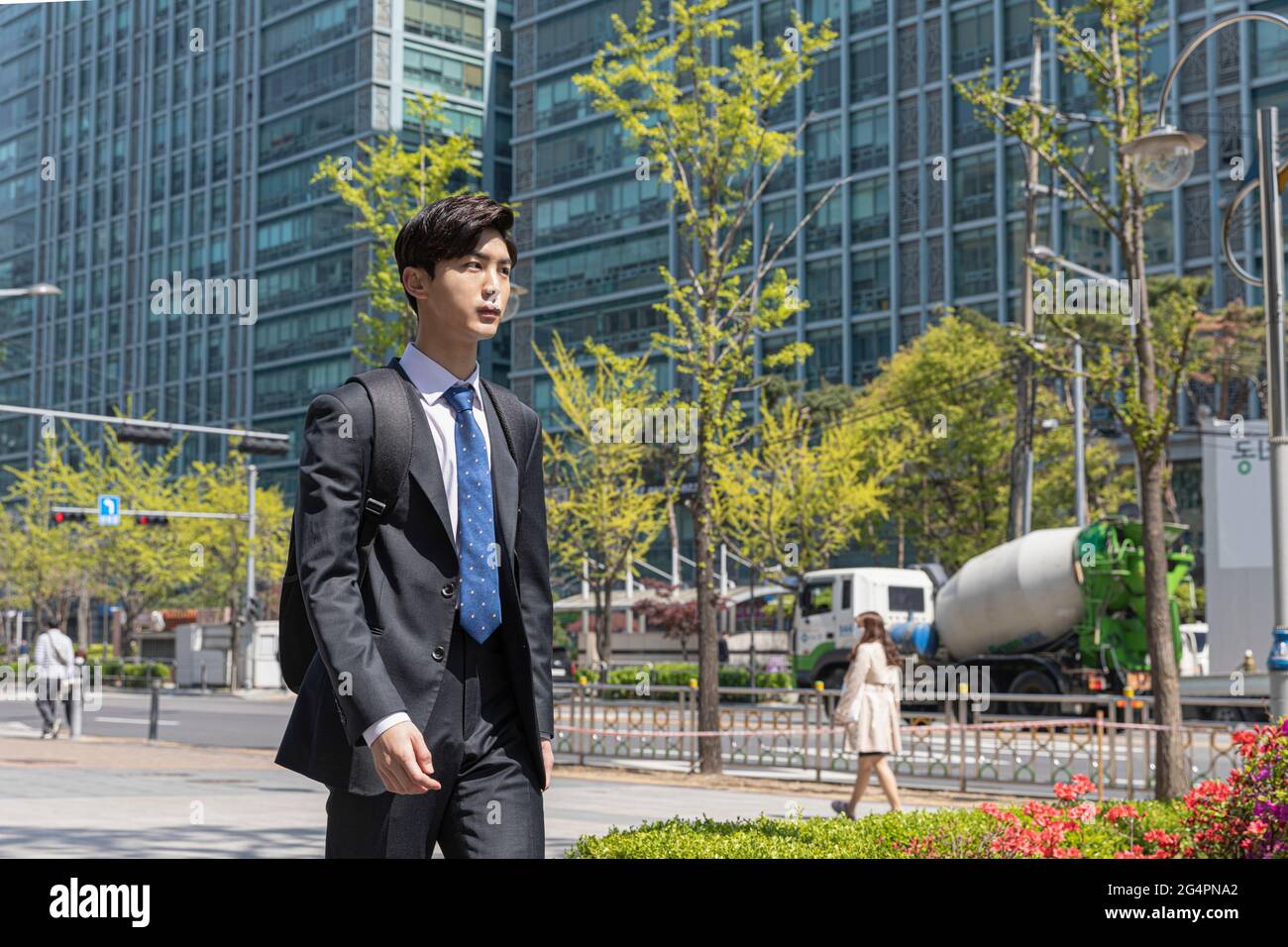 first day of newly recruited Asian man employee in smart casual suit ...