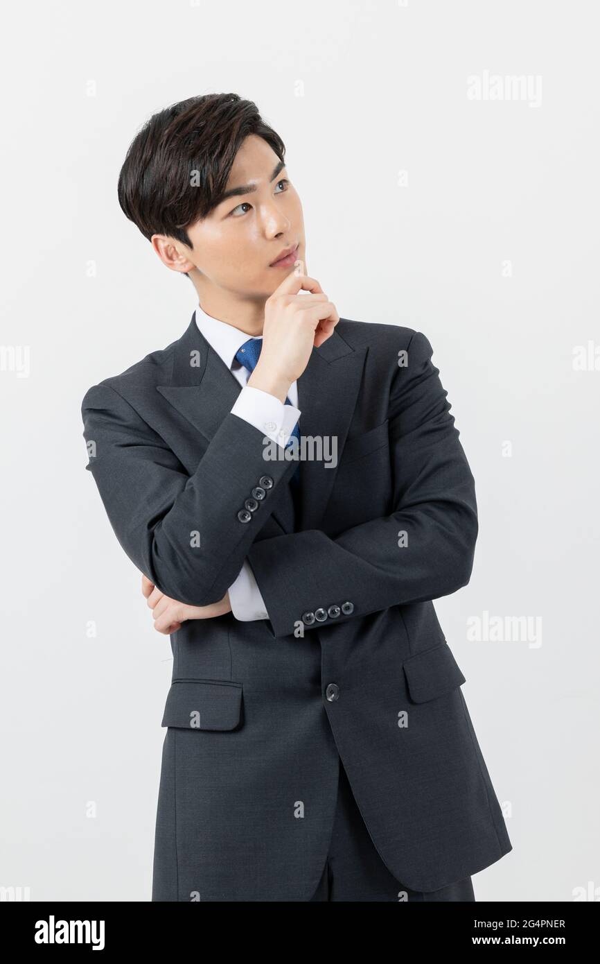 Worried asian man worker hi-res stock photography and images - Alamy