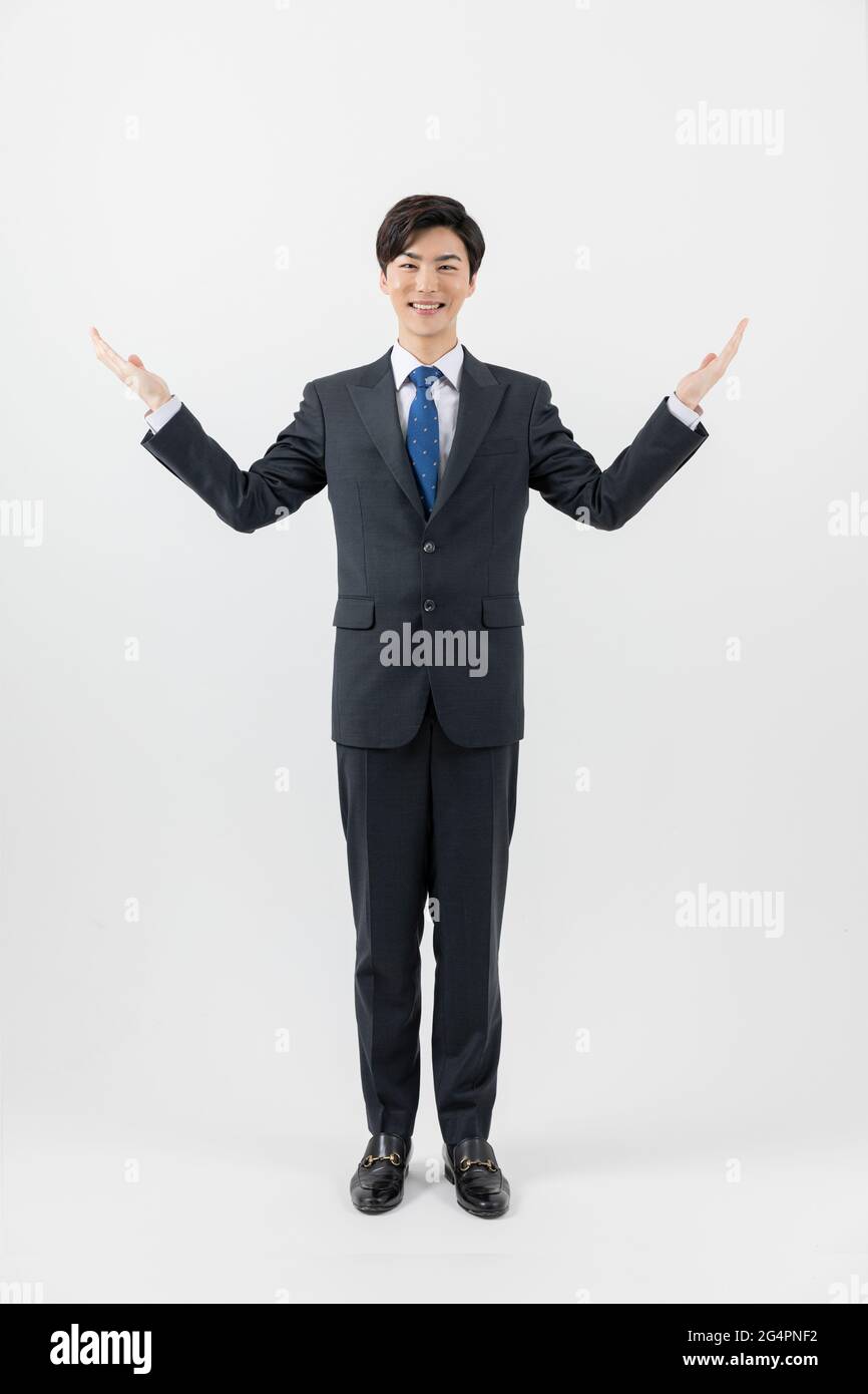 Man laugh young suit gesture hi-res stock photography and images - Alamy