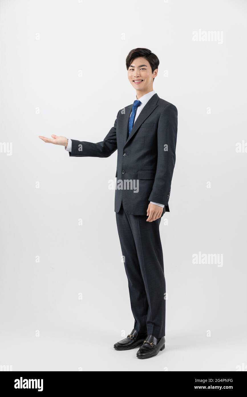 Man laugh young suit gesture hi-res stock photography and images - Alamy
