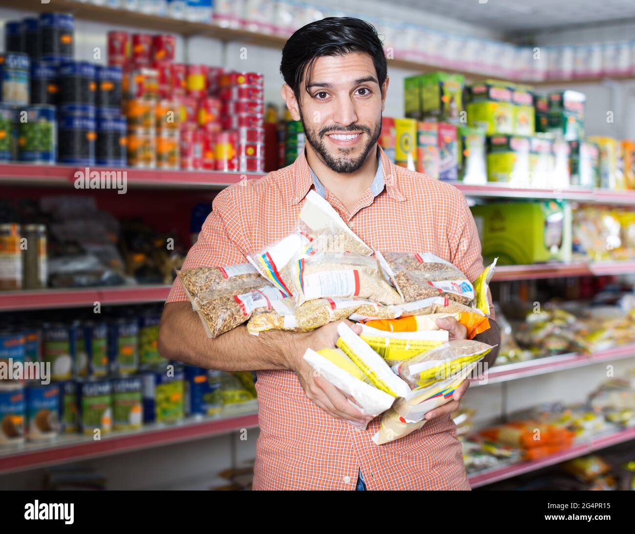 customer who is standing with purchases Stock Photo - Alamy