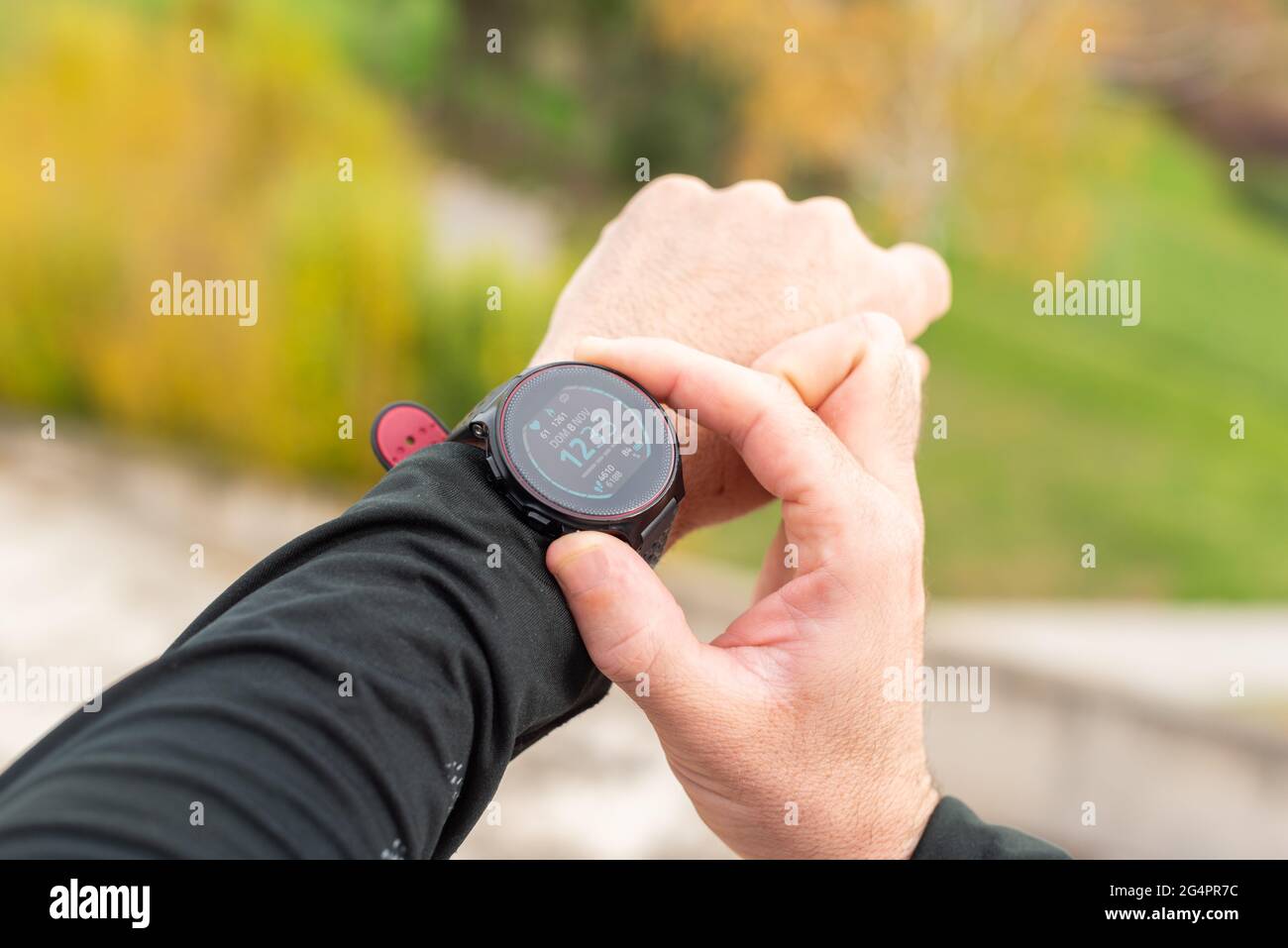 Runner man checking stopwatch. Hands detail. Unrecognizable Stock Photo ...