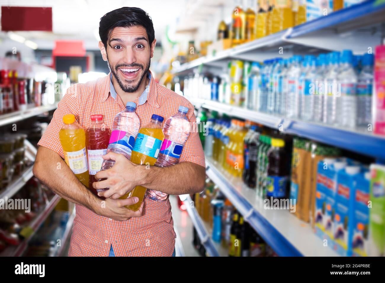 Portrait of male who is standing with drinks Stock Photo - Alamy
