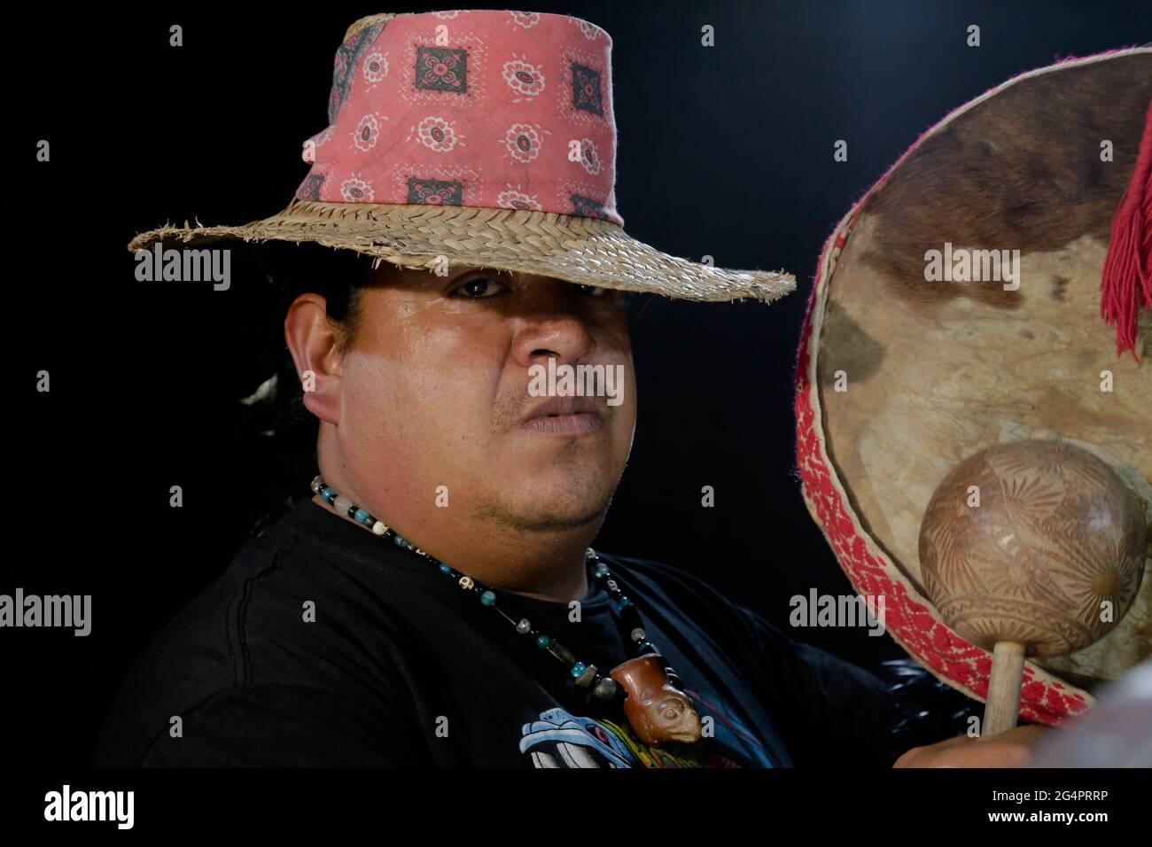 Closeup shot of a scary Mexican shaman performing ancient traditional ...