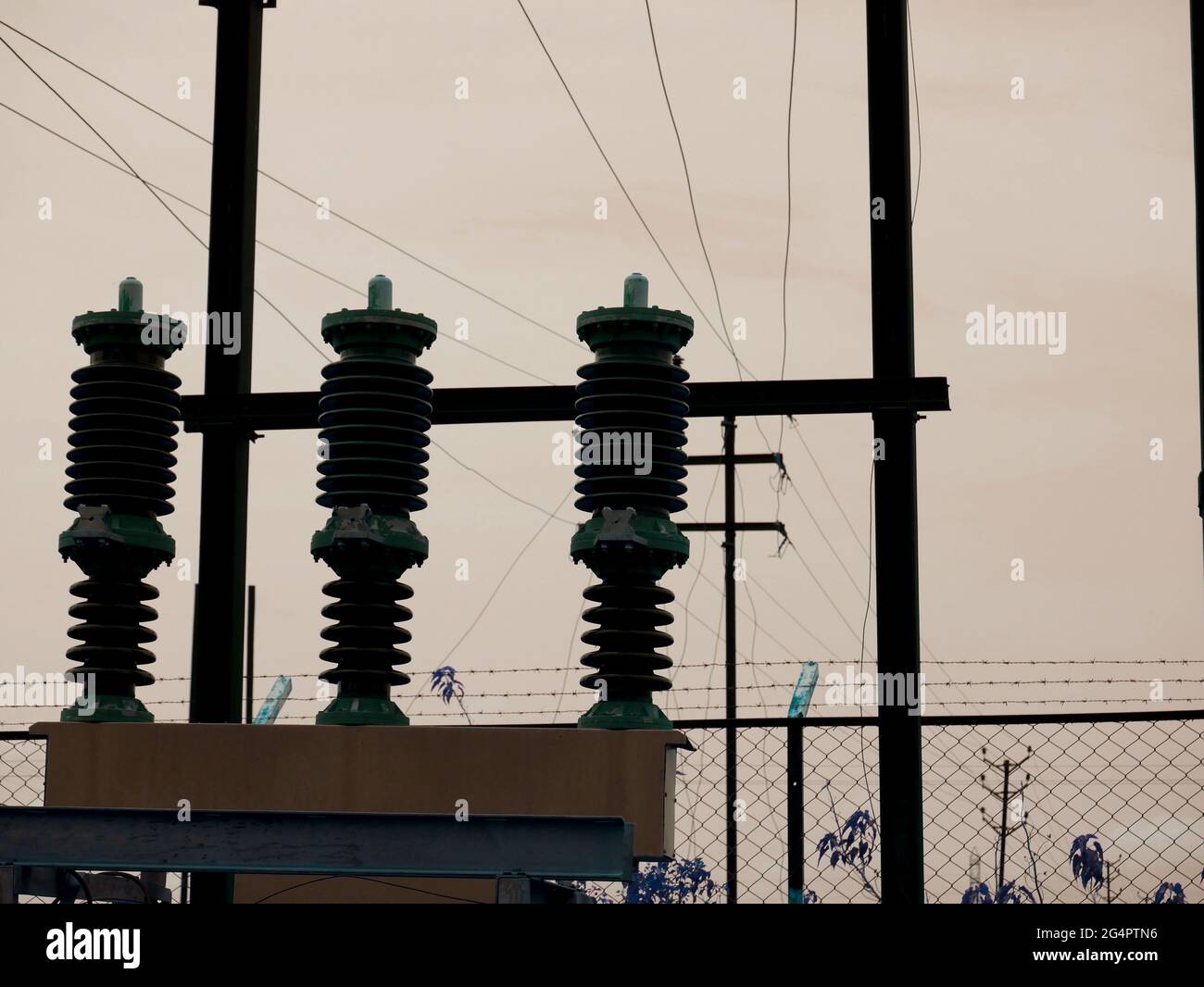 Industrial electric supply heavy equipment tower on sky background ...