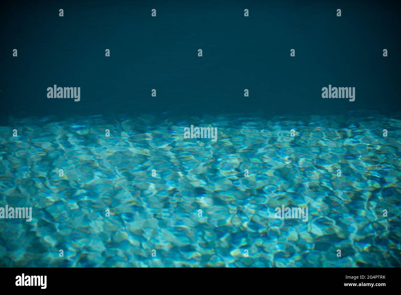 Abstract ripple wave and clear turquoise water surface in swimming pool ...