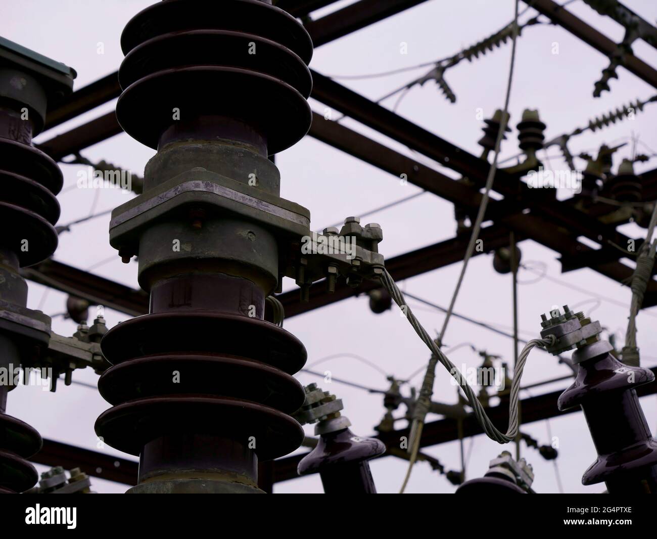 Industrial electric supply heavy equipment tower on sky background ...