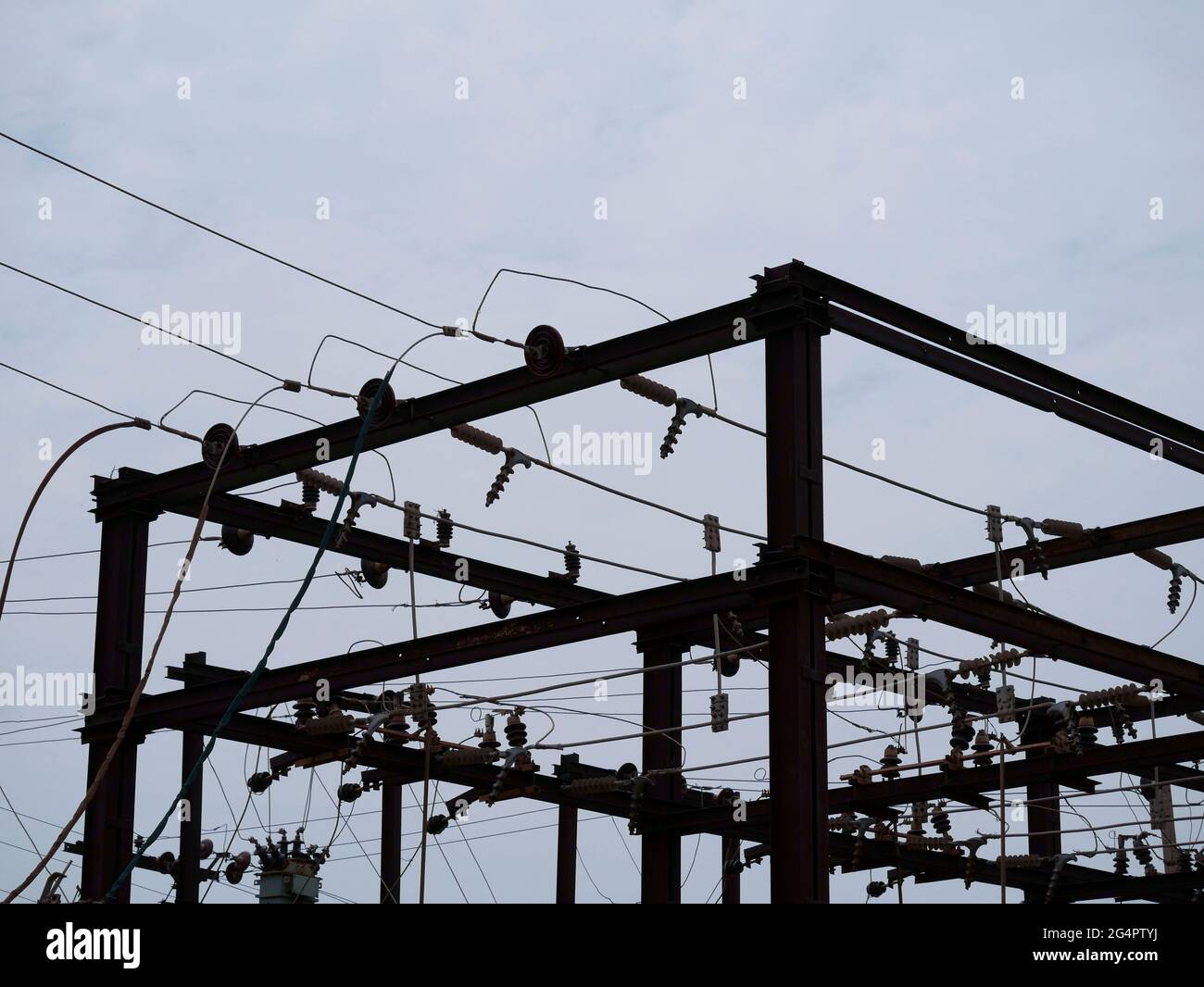 Industrial electric supply heavy equipment iron block on sky background ...