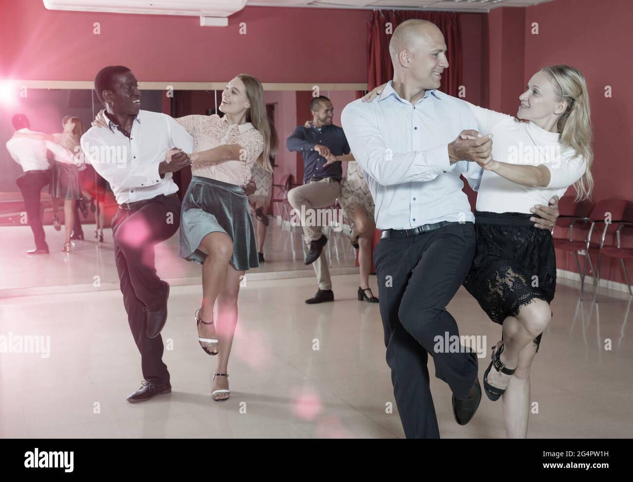 People dancing rock-and-roll in pairs Stock Photo - Alamy