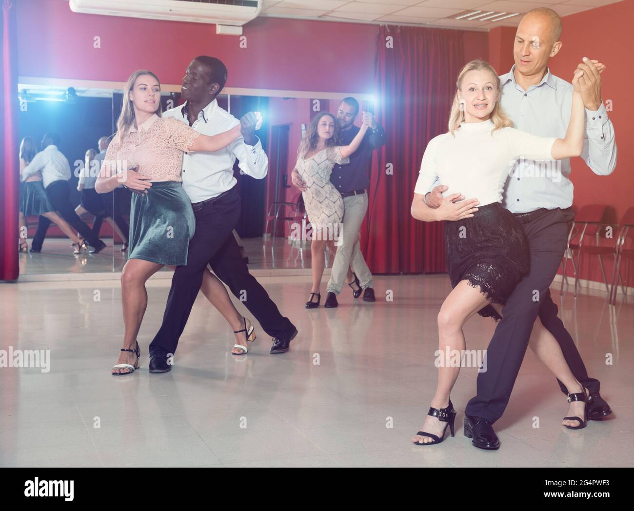 Smiling female salsa dancer hi-res stock photography and images - Alamy