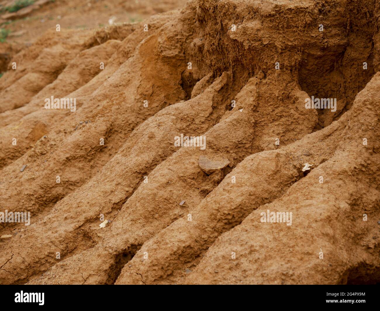 Water mark due to rain on horizontal soil field, Land slide concept ...