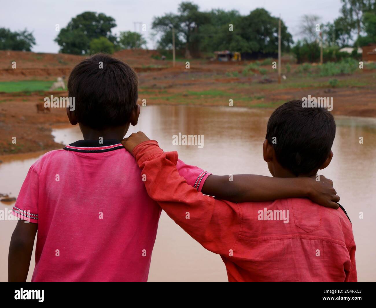 Two village poor kids kept hand on each others shoulder, kids ...
