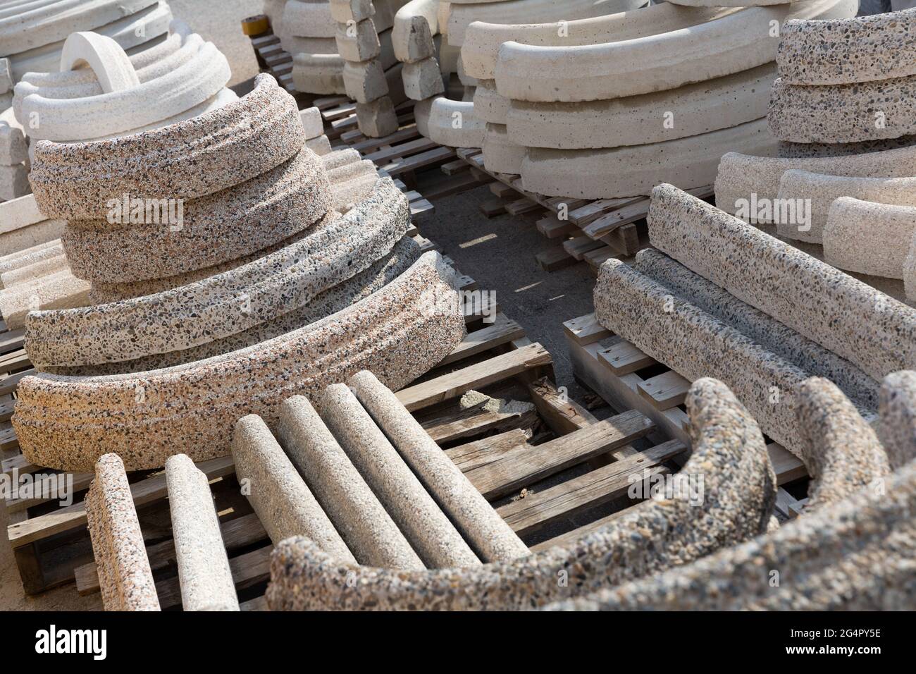 Semicircular rings made of concrete on pallets of hardware store Stock ...