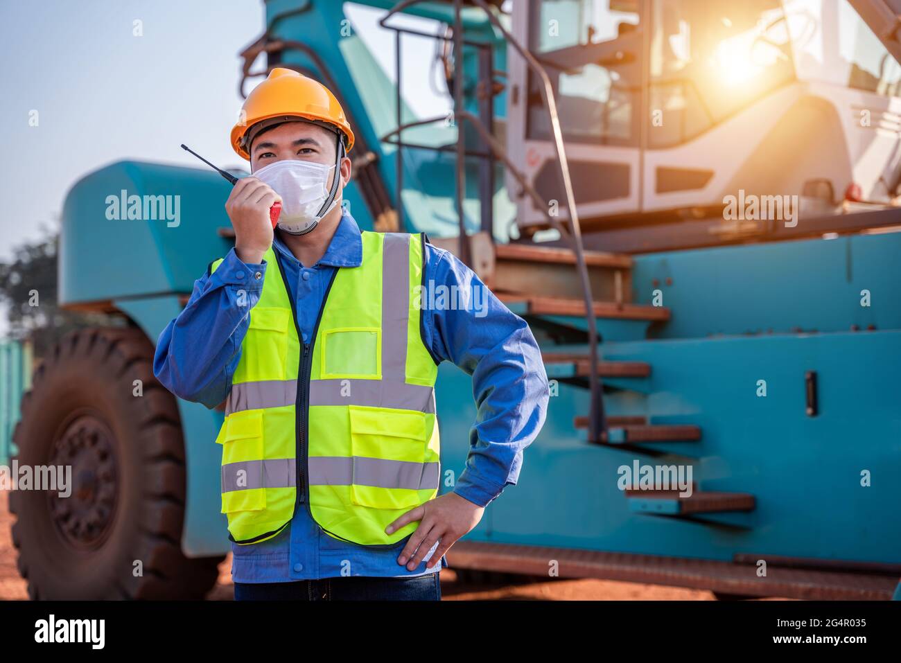 Warehouse asian man worker driver truck driver crane lifting up ...