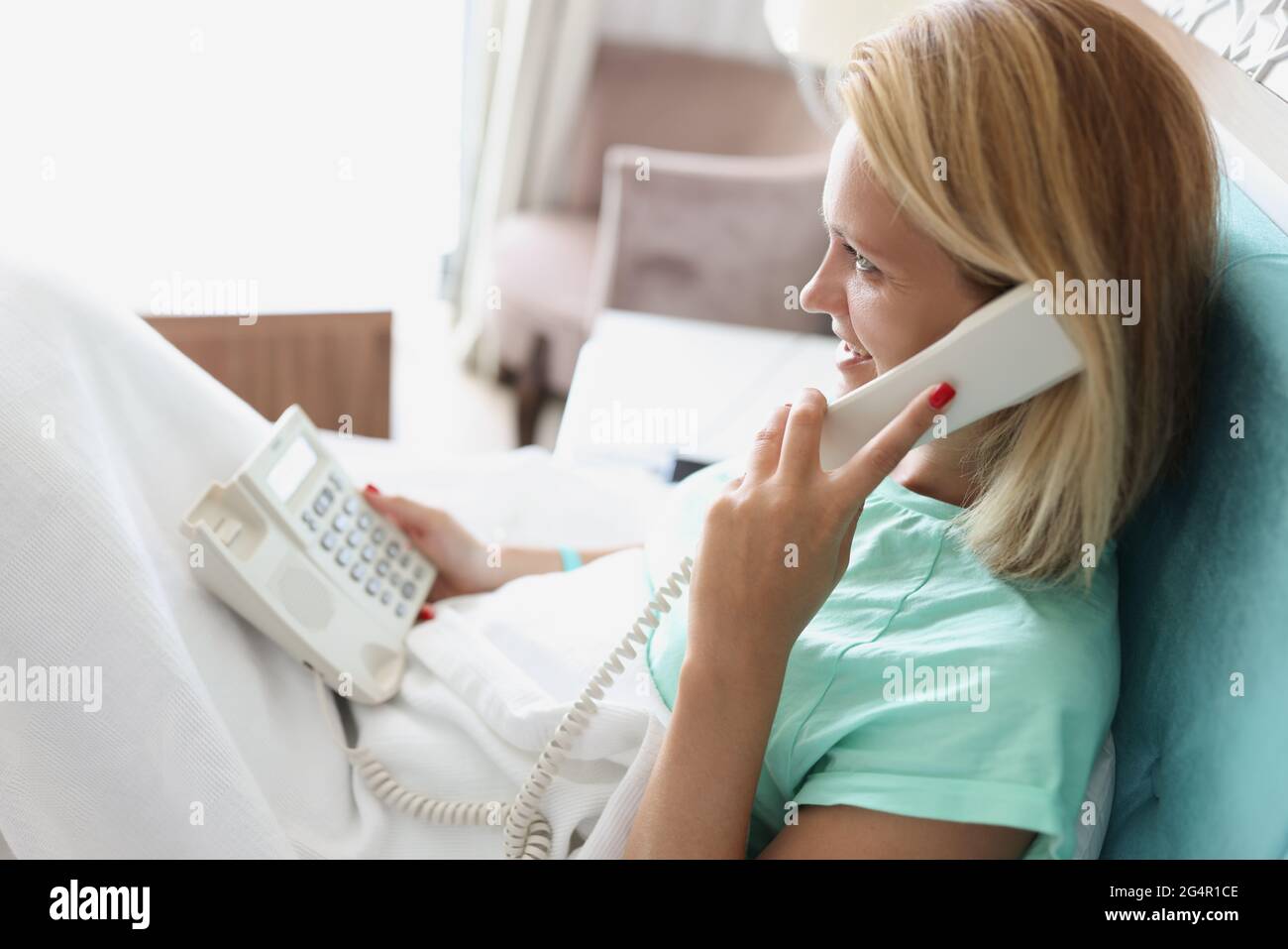 Room service telephone hotel hi-res stock photography and images - Alamy