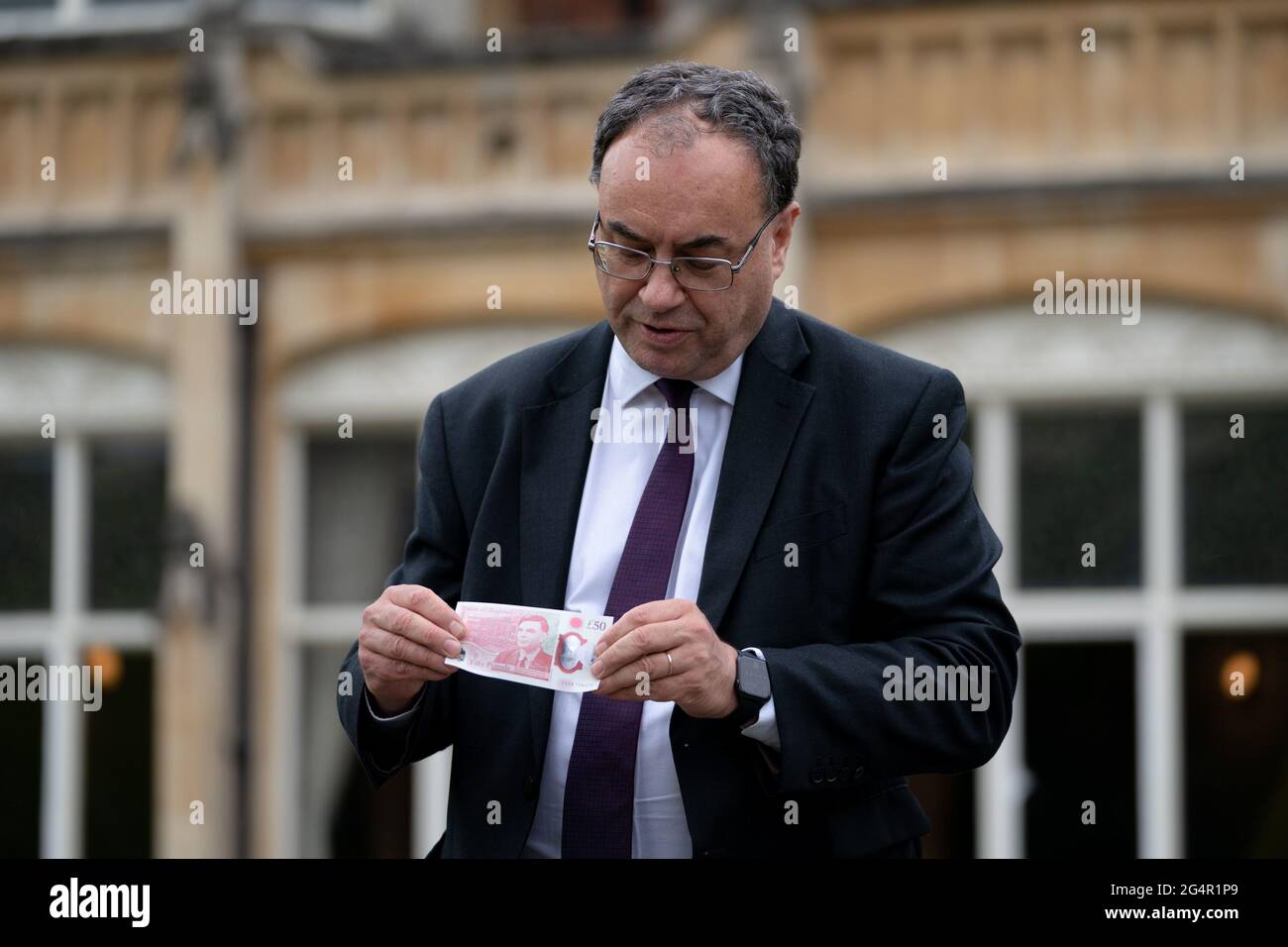 Governor of the Bank of England Andrew Bailey with the new £50 note ...