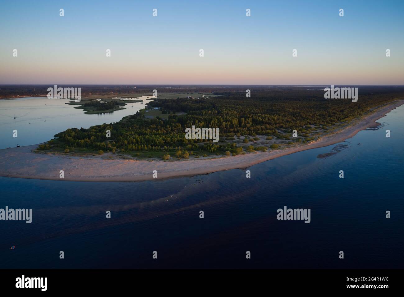 The mouth of the river flowing into the sea. Aerial view Stock Photo ...