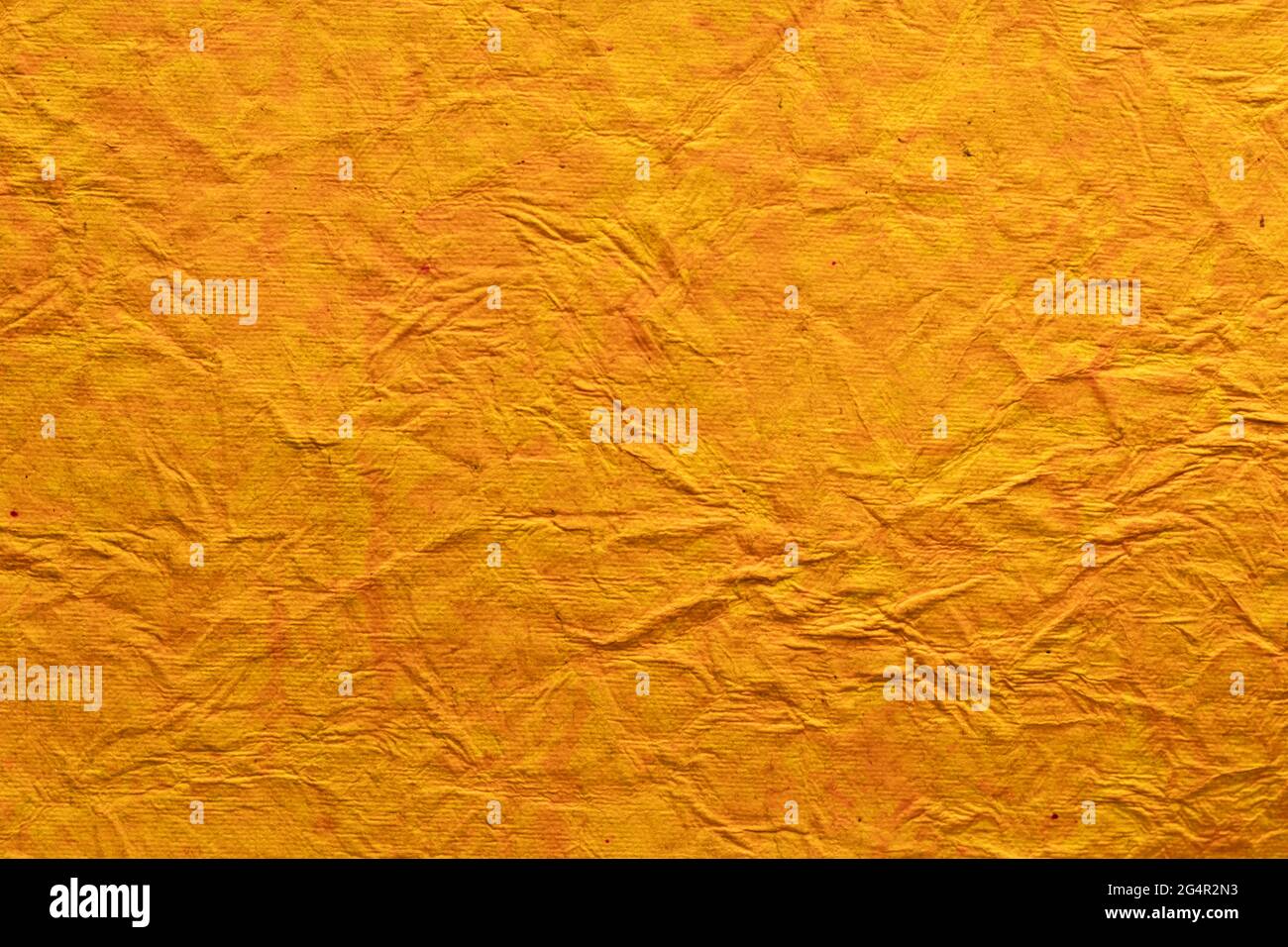 Background with yellow colour crushed paper Stock Photo - Alamy