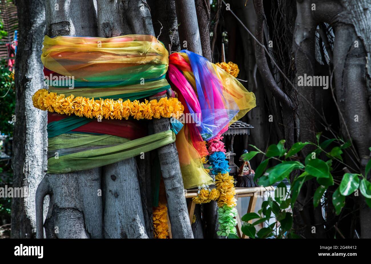 Marigold flower garlands and Fabric colors Colorful wrapped around the ...
